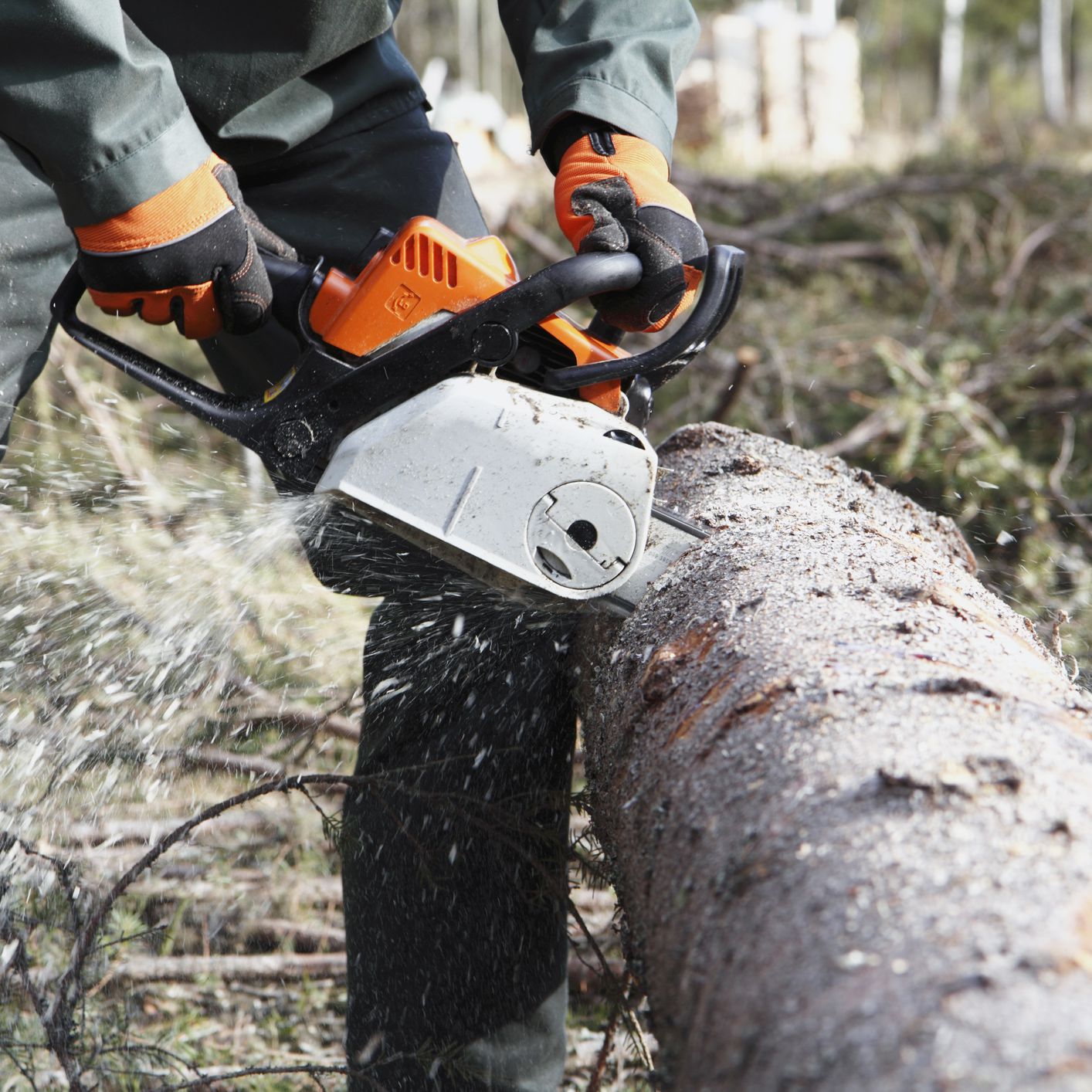 How to Use a Chainsaw Properly and Safely [Guide] - Organize With Sandy