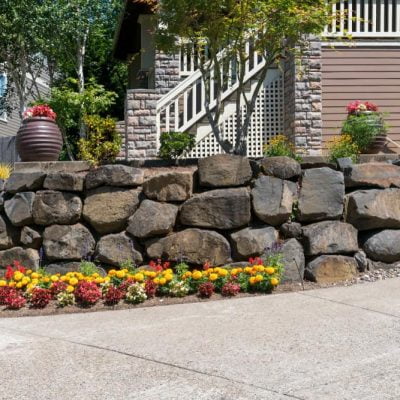 How to Fix a Bulging Retaining Wall - Organize With Sandy