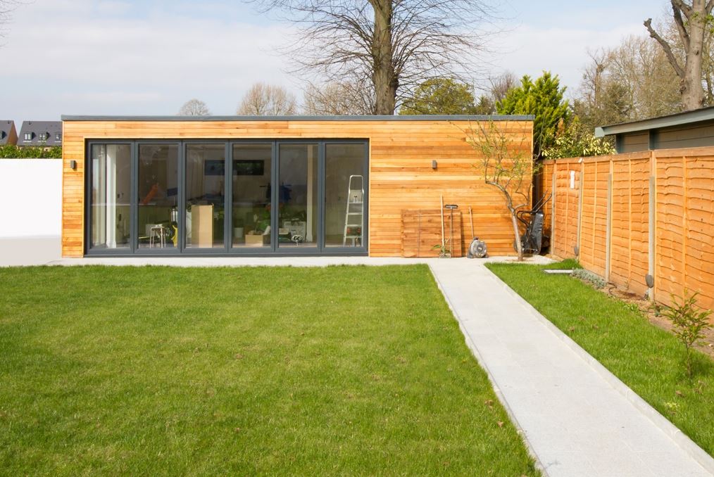 The Benefits To Adding An Outbuilding To Your Garden - Organize With Sandy