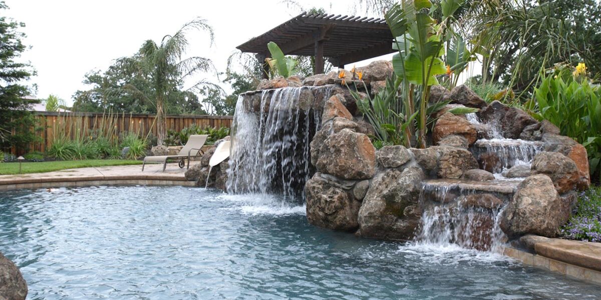 How Much Does It Cost to Build a Pool in Your Backyard - Organize With ...